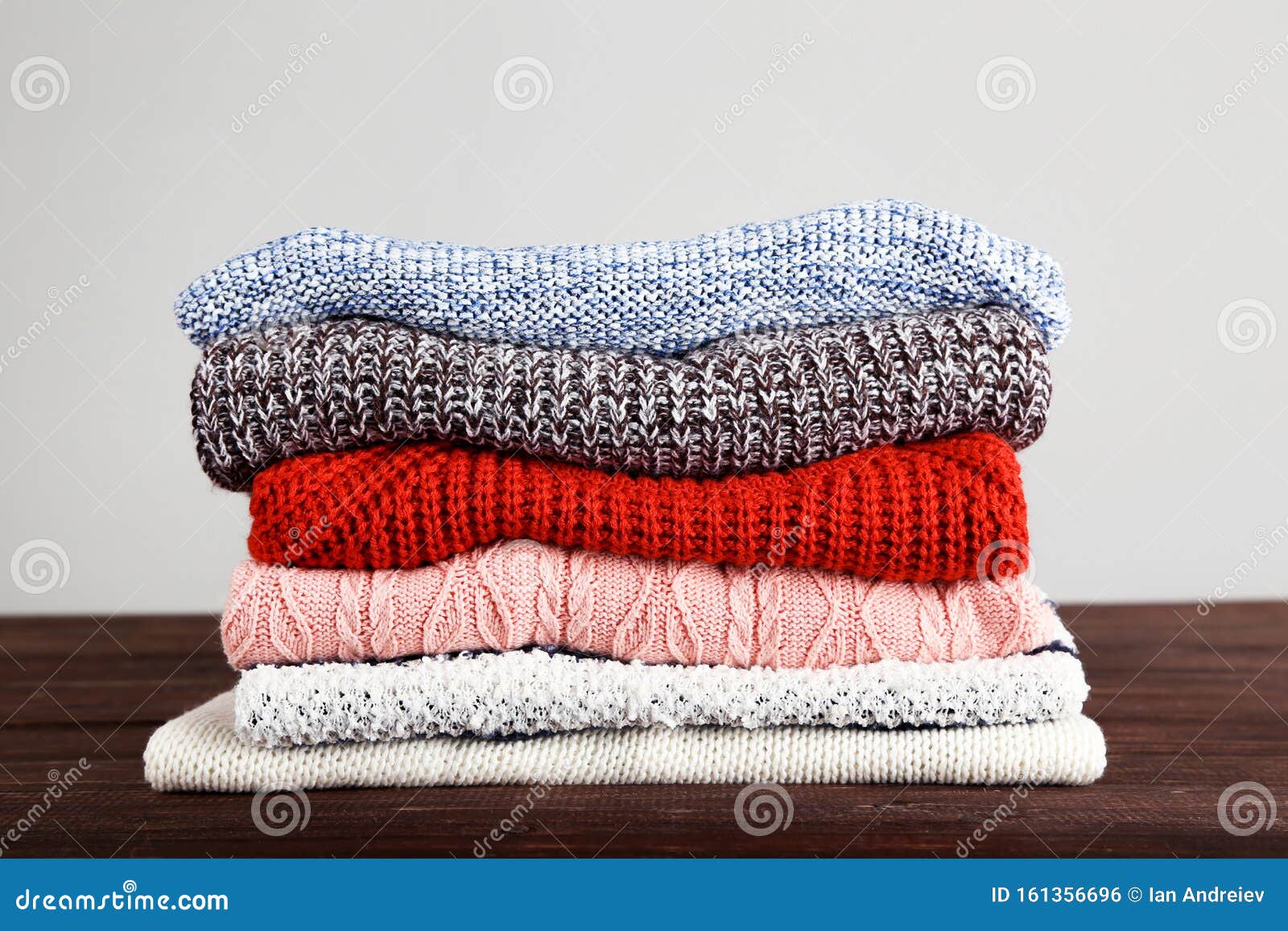 Folded knitted sweaters stock photo. Image of fashion - 161356696