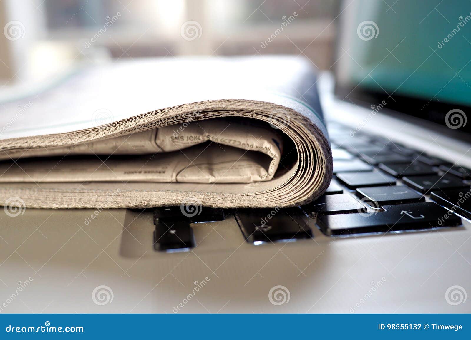 Newspaper on a Laptop Keyboard Stock Photo - Image of finance, data ...