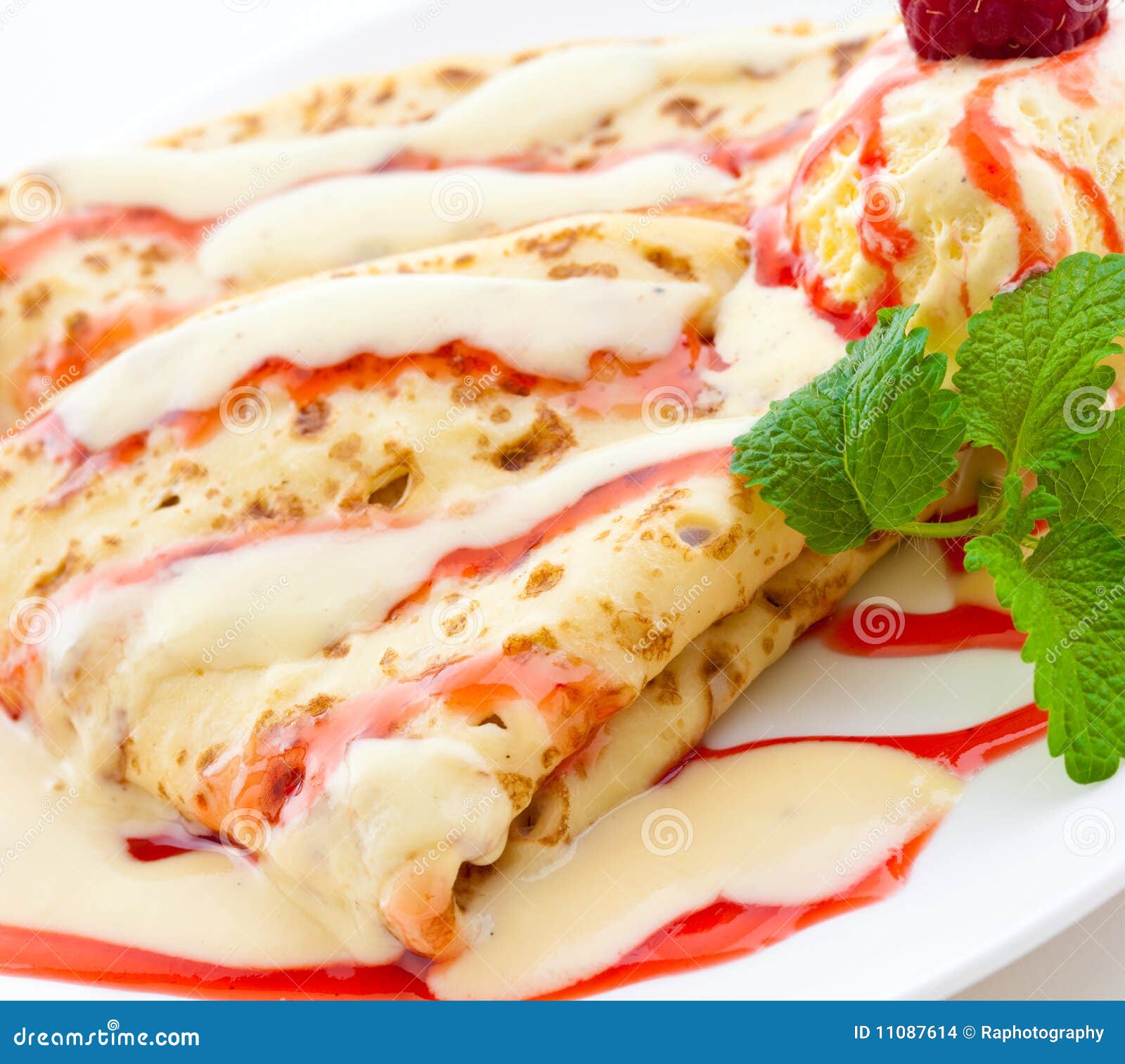Folded Pancakes with Vanilla and Raspberry Sauce Stock Photo - Image of ...