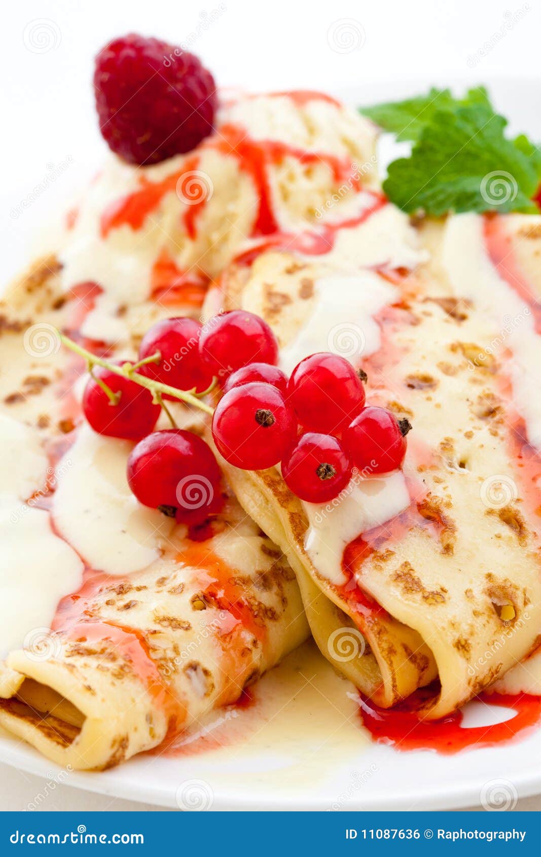 Folded Pancakes with Vanilla and Raspberry Sauce Stock Photo - Image of ...