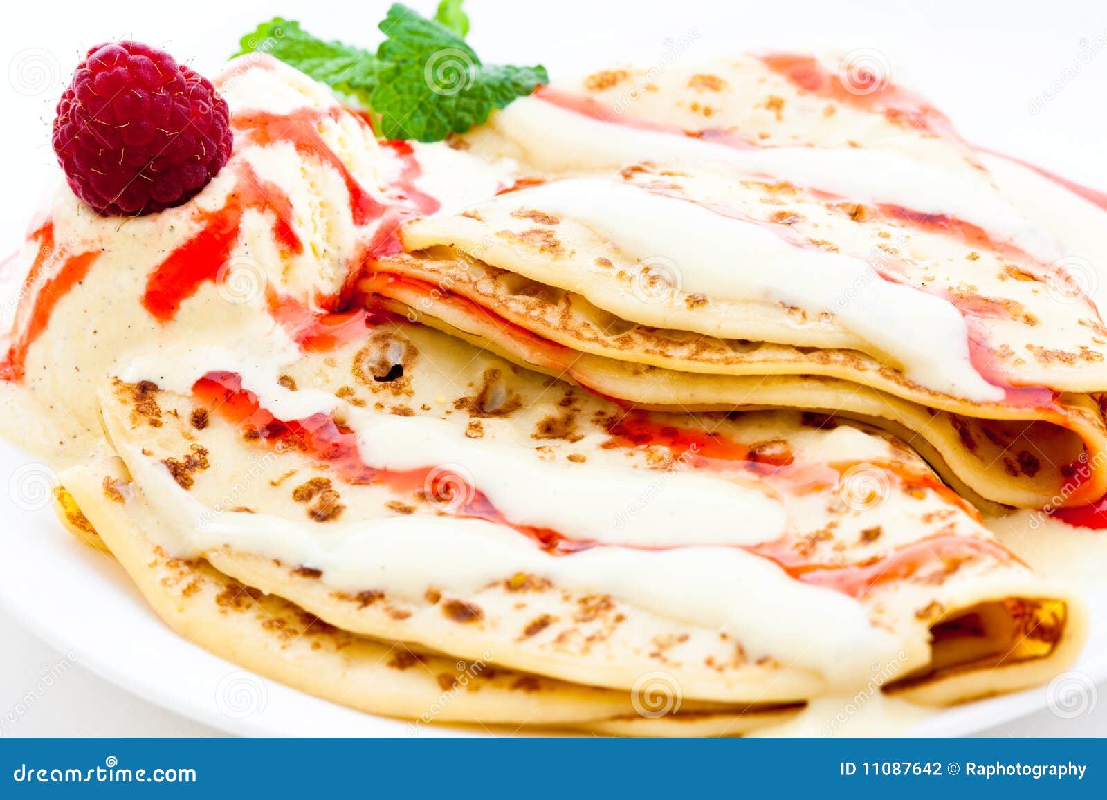 Folded Pancakes with Vanilla and Raspberry Sauce Stock Photo - Image of ...