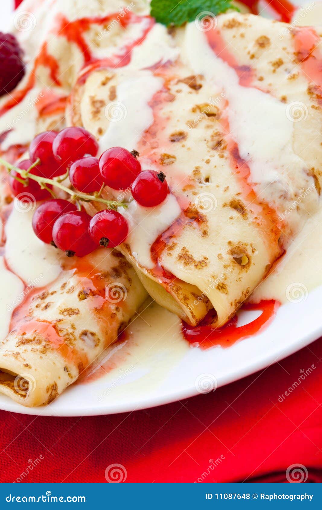 Folded Pancakes with Vanilla and Raspberry Sauce Stock Photo - Image of ...