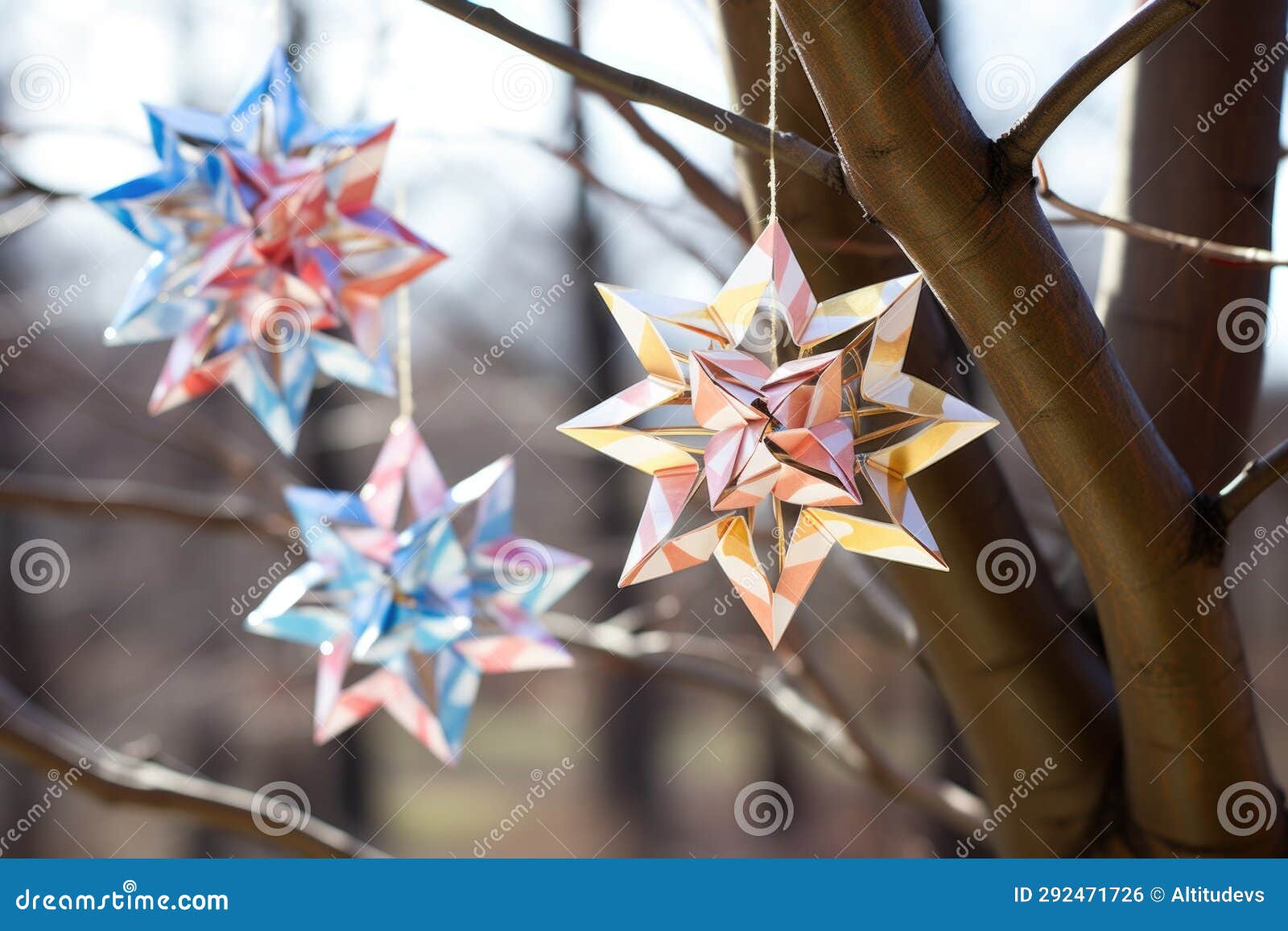 Folded Paper Star of David Ornaments Hanging on Tree Branches Stock ...