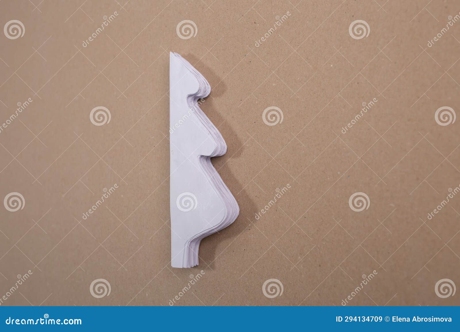 A Folded Piece of Paper Sitting on Neutral Surface, Process Art, Cut ...