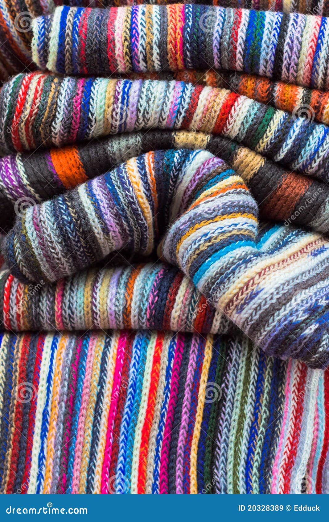 A Folded Pile of Colorful Cloth Stock Image - Image of colored ...