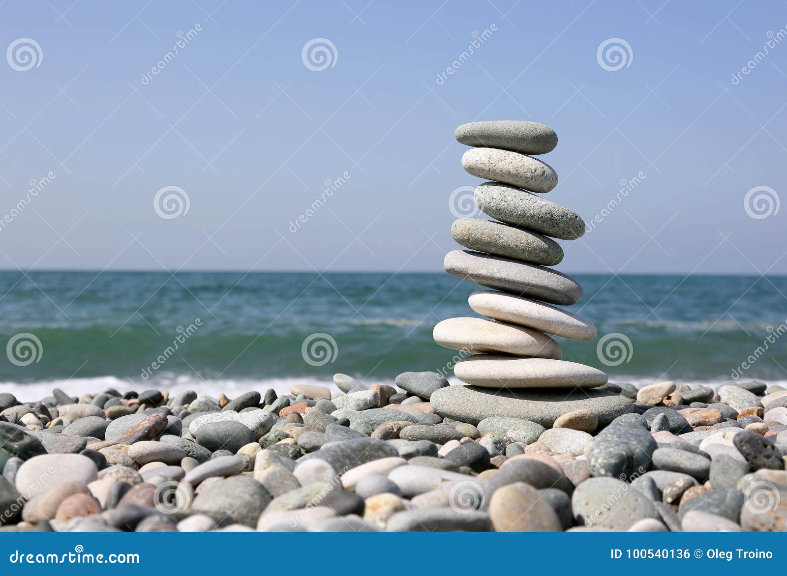 Folded Pyramid of Smooth Stones on the Seashore Stock Photo - Image of ...