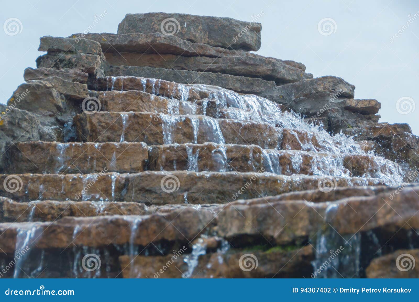 In Folded Rocks, Flowing Water Stream Background. Stock Photo - Image ...
