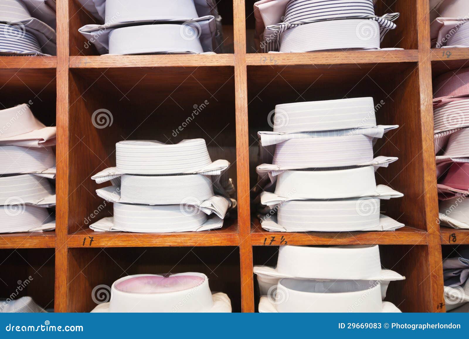 Folded Shirts on Clothes Rack Stock Image - Image of consumerism, store ...