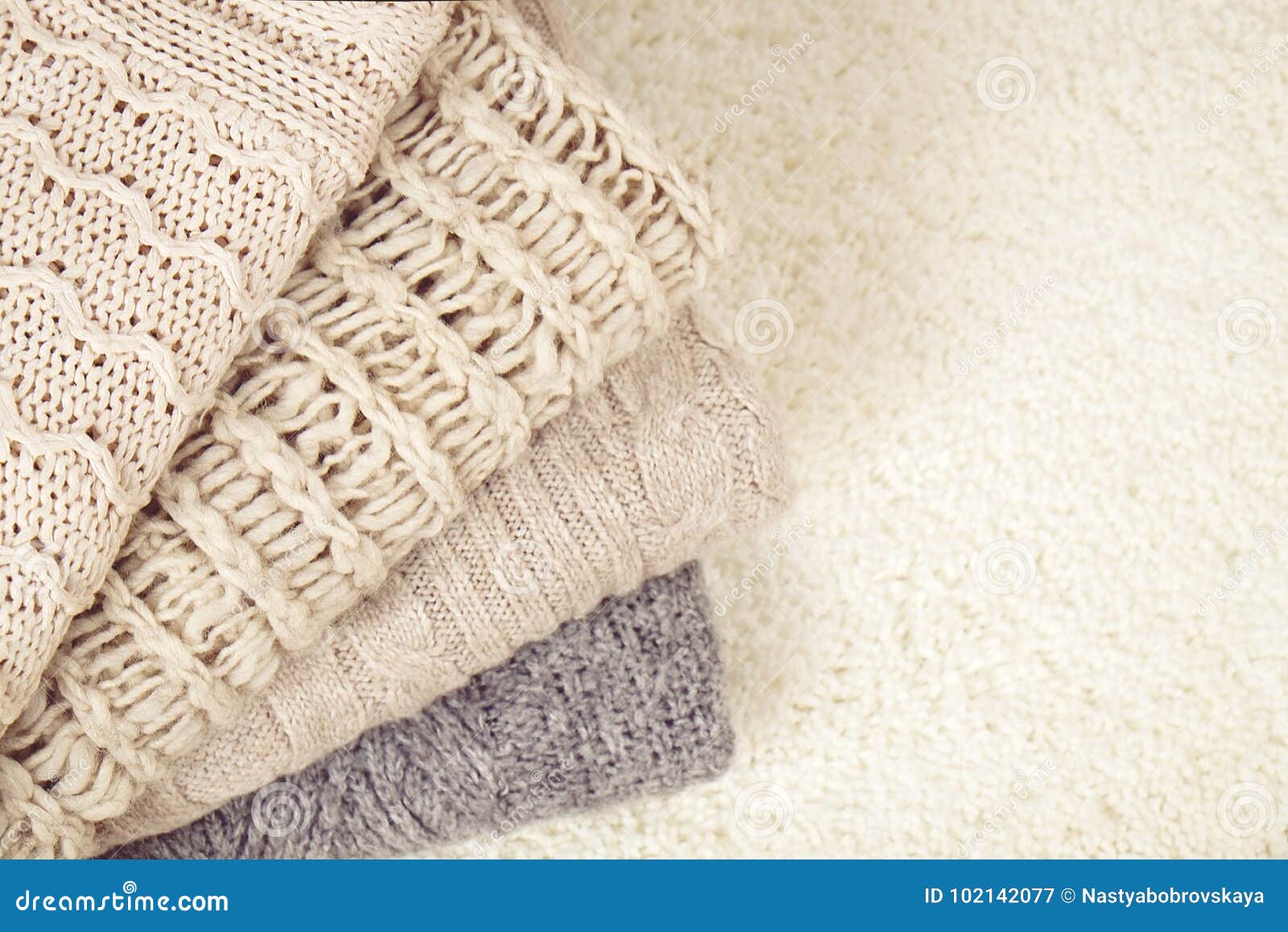 Folded Sweaters Gradient on White Rug Stock Image - Image of decoration ...