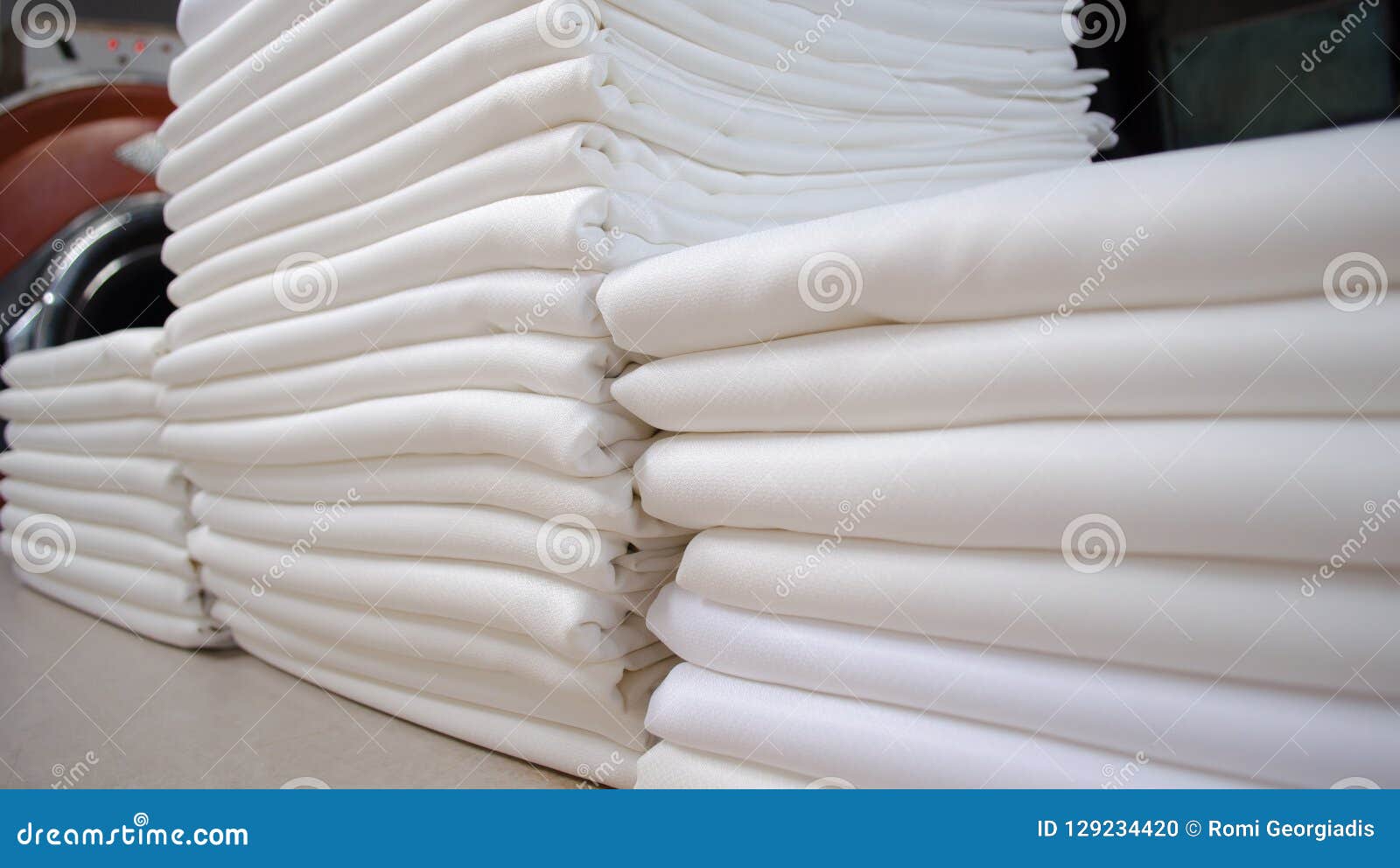 Folded White Cloths in a Laundry Stock Photo - Image of laundry, cloths ...