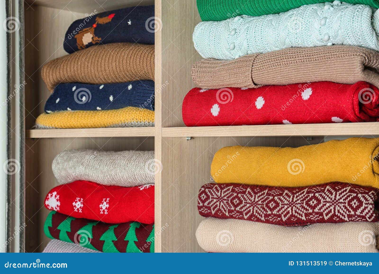 Folded Winter Clothes on Shelves Stock Image - Image of knitwear ...