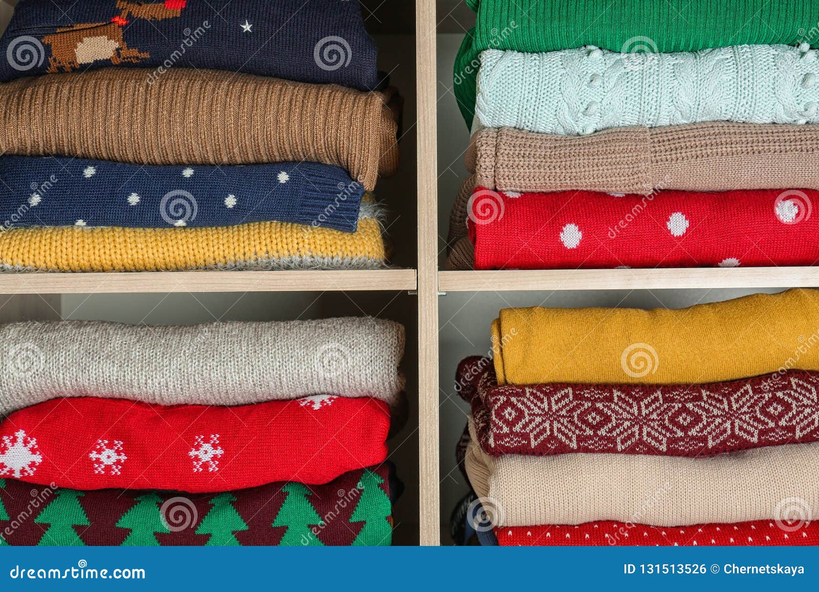 Folded Winter Clothes on Shelves Stock Photo - Image of clothing ...