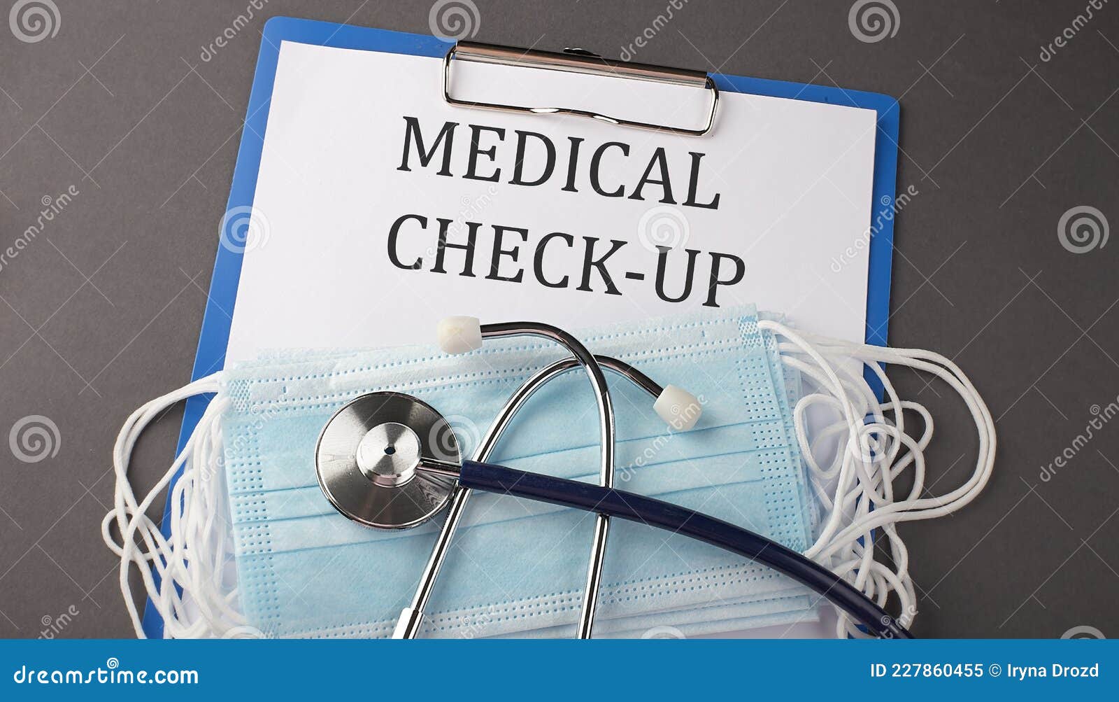 Folder with Paper Text MEDICAL CHECK-UP , on a Table with a Stethoscope ...