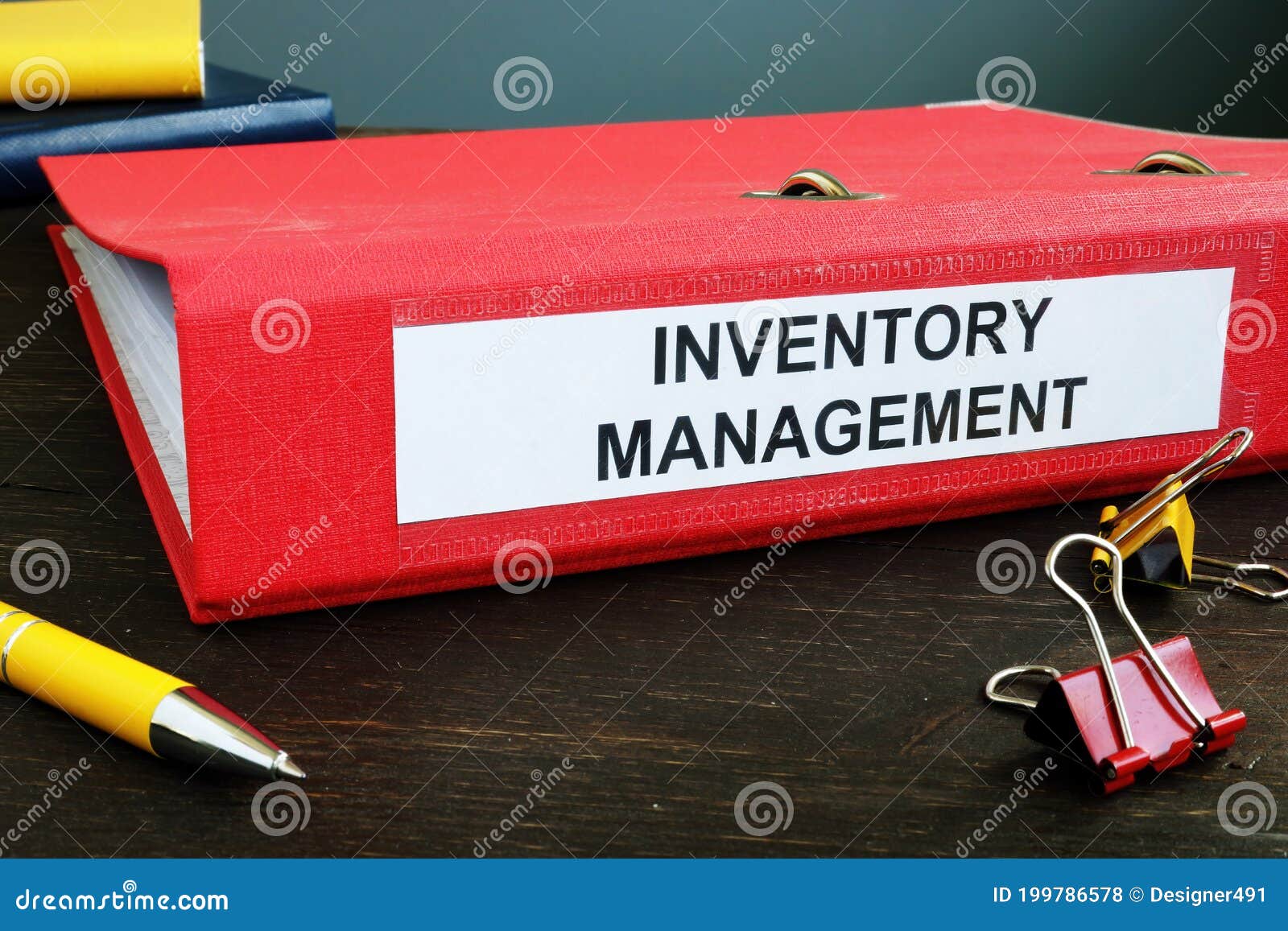 Folder with Papers about Inventory Management and Pen. Stock Photo ...