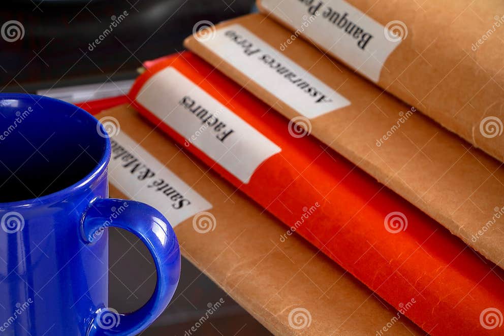Folder Stack on a Desktop with a Cup of Coffee Stock Image - Image of ...