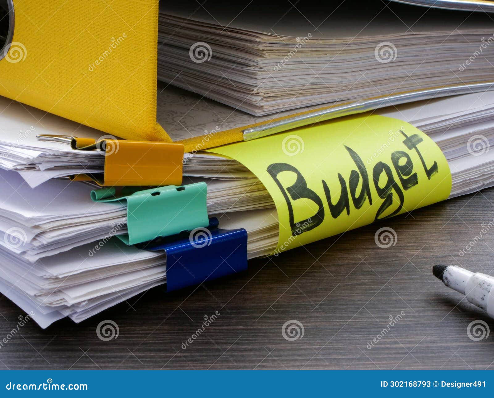 A Folder with Stack of Papers and the Word Company Budget. Stock Image ...
