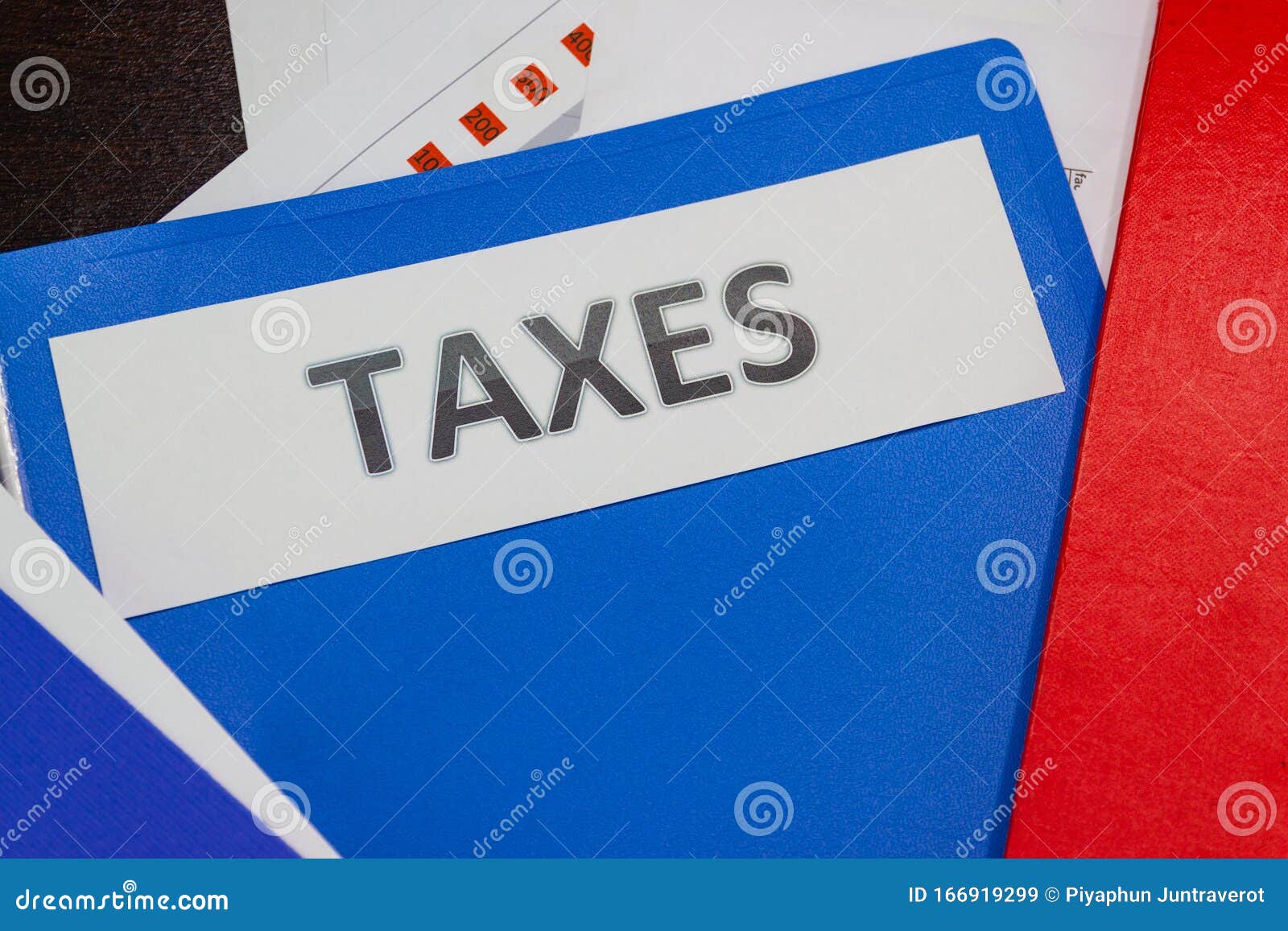 Folder Tax Documents and Paper Files on Table Stock Image - Image of ...