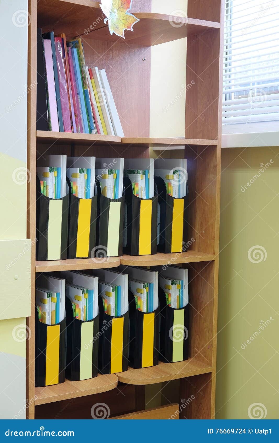 Folders on a shelf stock photo. Image of organize, work - 76669724