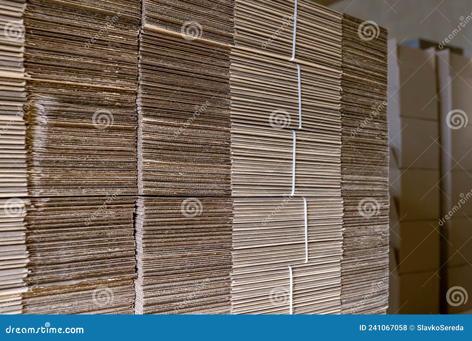 Folding Cardboard Boxes. Perforated Sheets of Corrugated Cardboard are ...