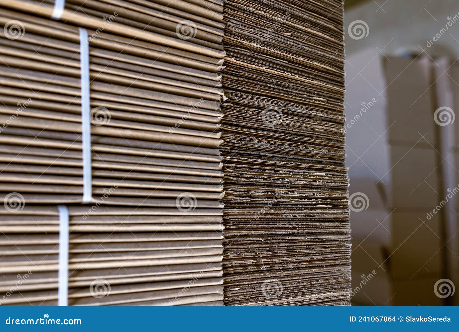 Folding Cardboard Boxes. Perforated Sheets of Corrugated Cardboard are ...