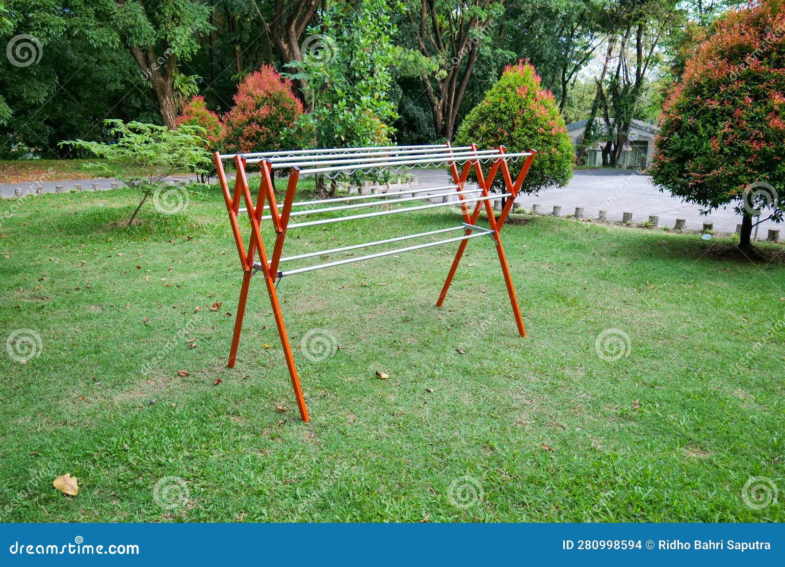 Folding Clothesline on the Green Grass Stock Photo - Image of nature ...