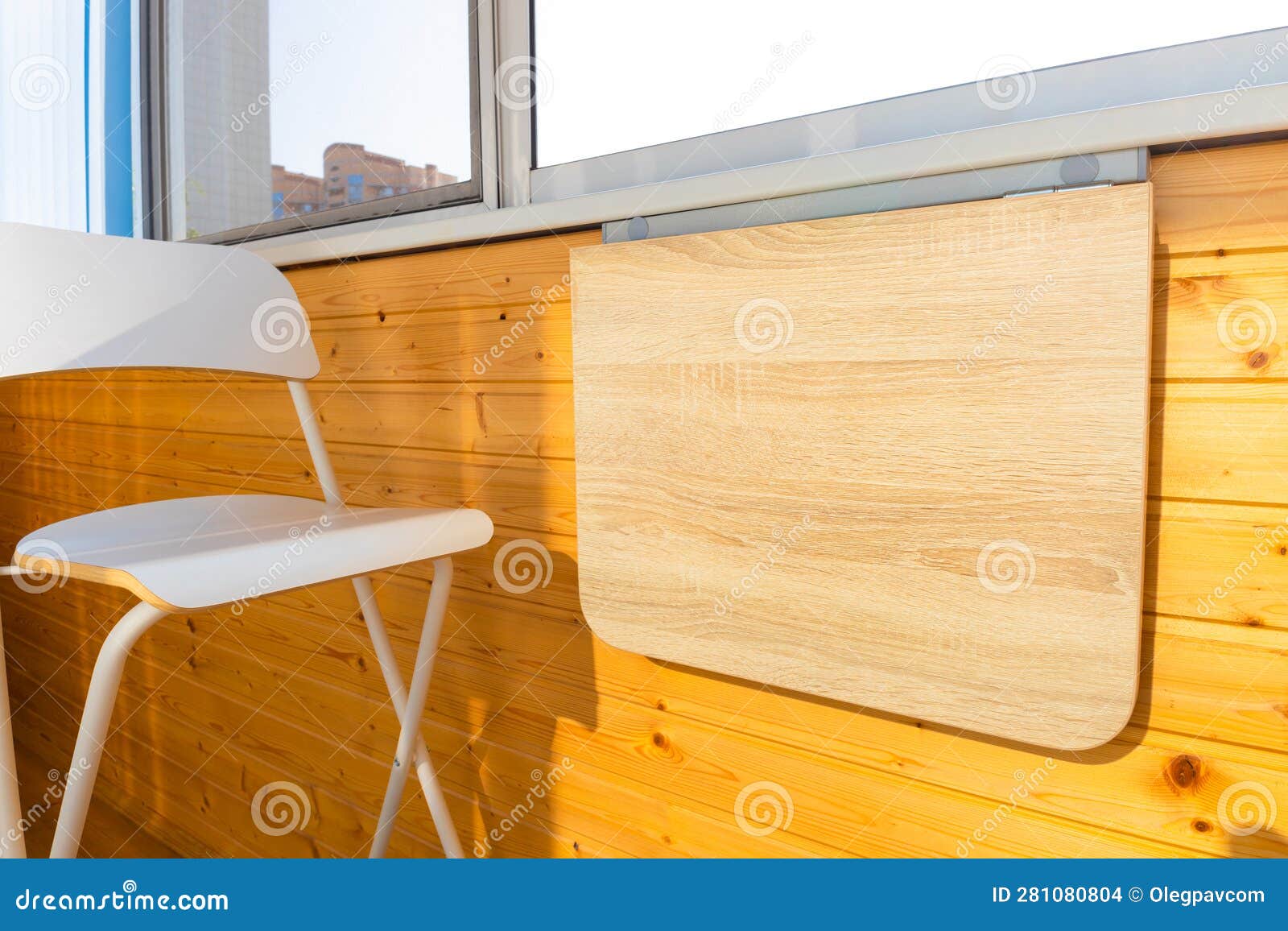 Folding Table in the Closed Position on the Balcony Stock Photo - Image ...