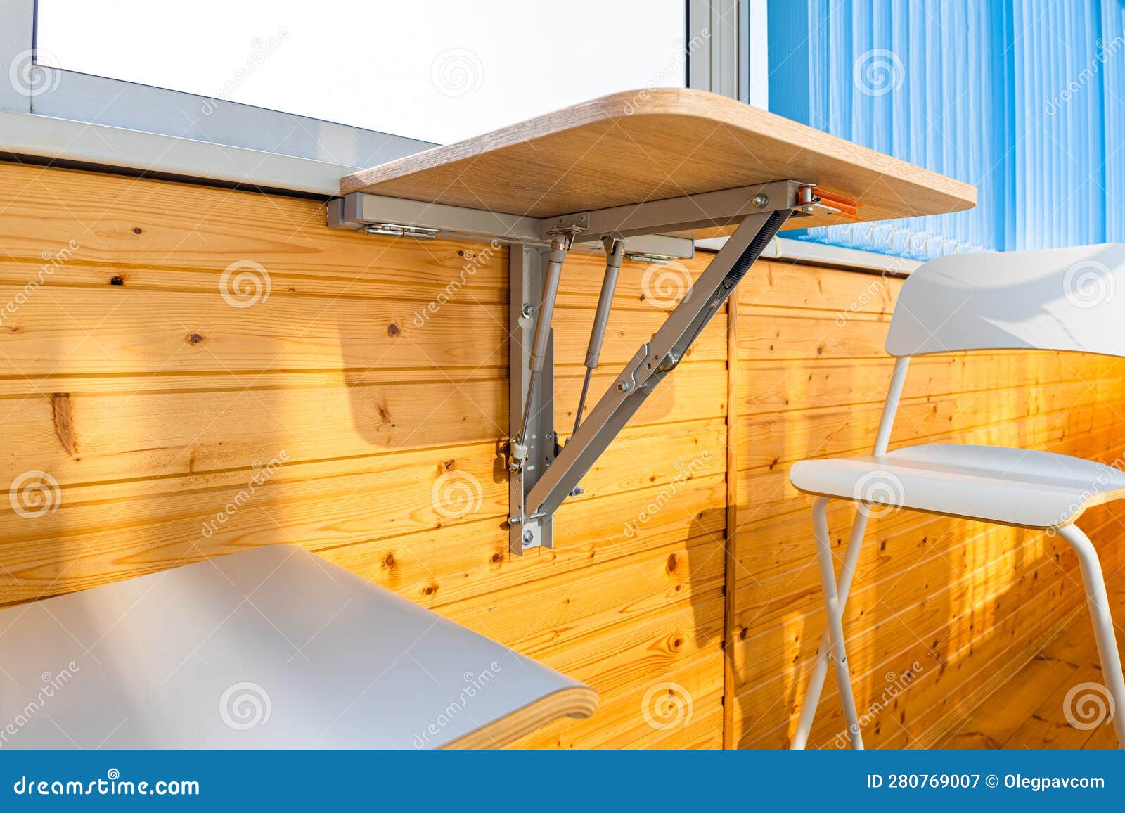 Folding Wooden Table Fixed on the Wall. Stock Image - Image of table ...