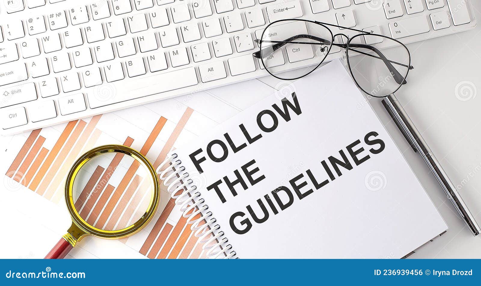 FOLLOW the GUIDELINES Text Written on a Notebook with Keyboard, Chart ...
