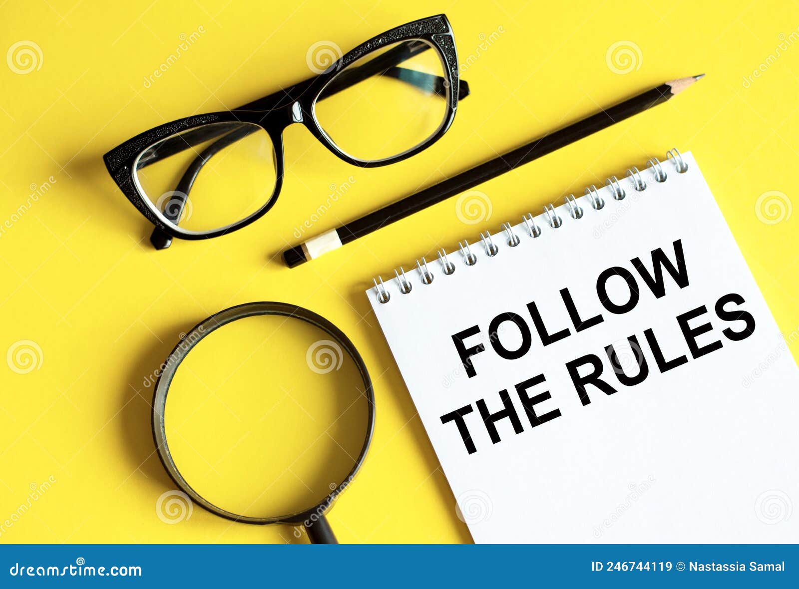 Follow the Rules Text Written on a Notebook with Glasses, Magnifying ...