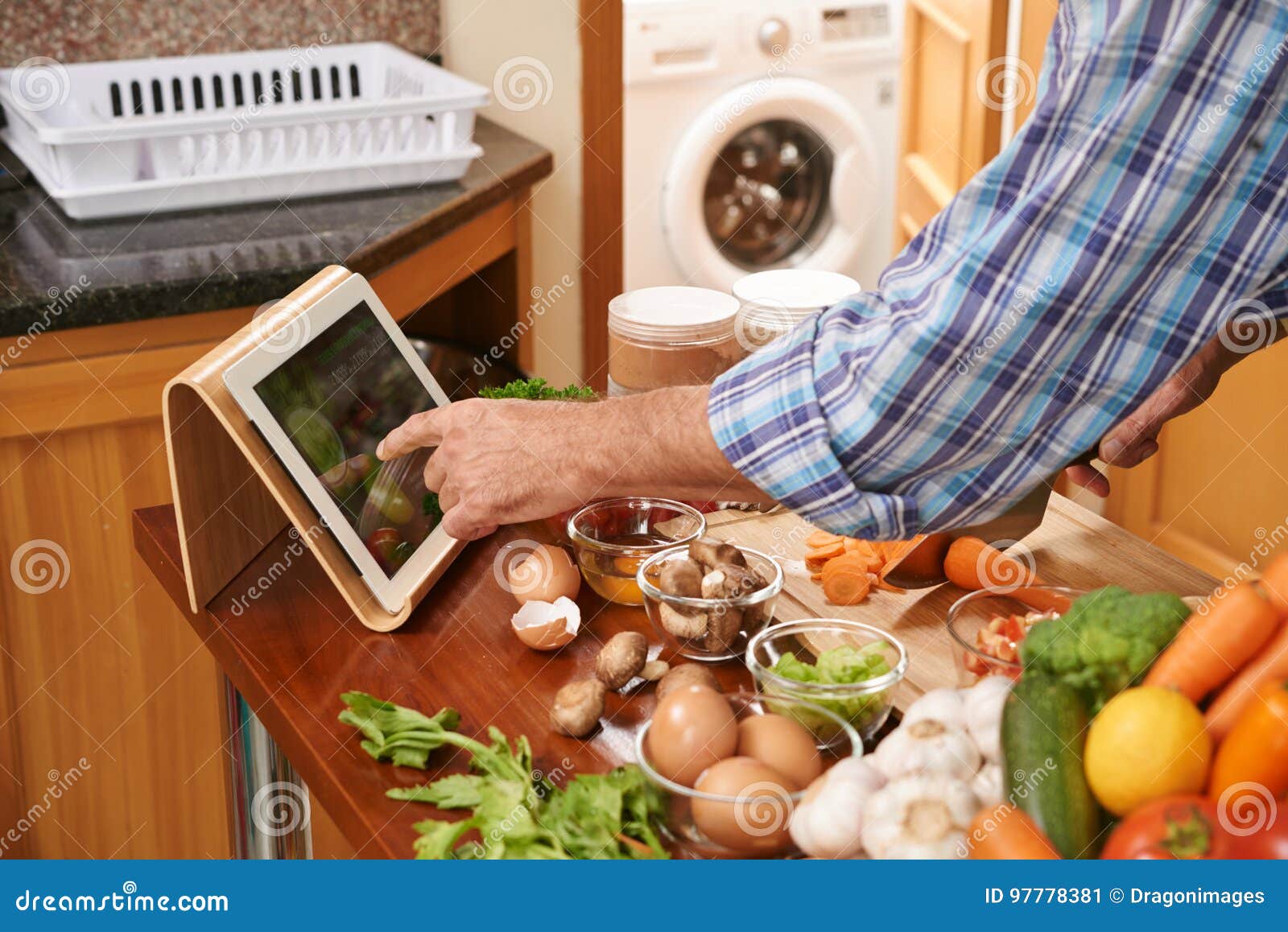 Following recipe stock image. Image of technology, cooking - 97778381