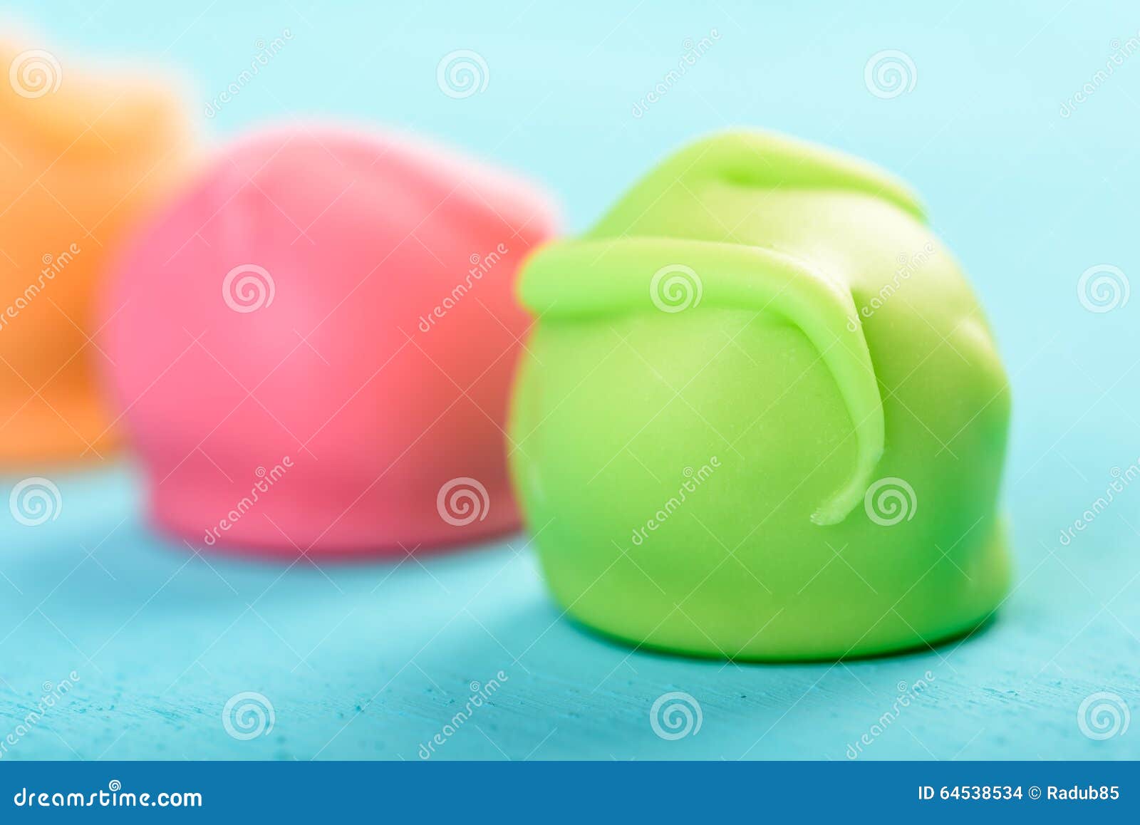 Fondant Candies on Turquoise Stock Photo - Image of blue, cookies: 64538534
