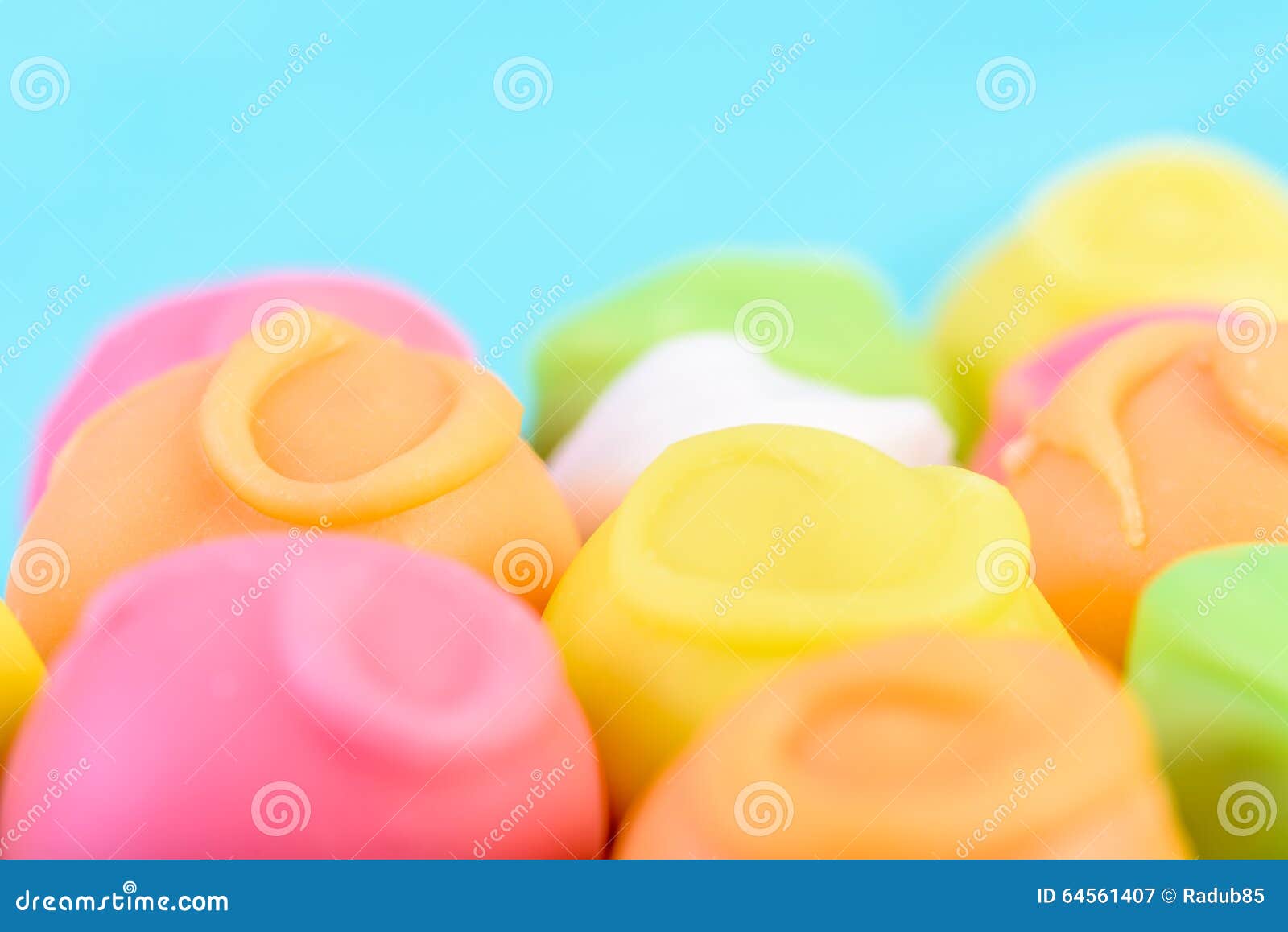 Fondant Candies on Turquoise Stock Image - Image of cupcake, bonbon ...