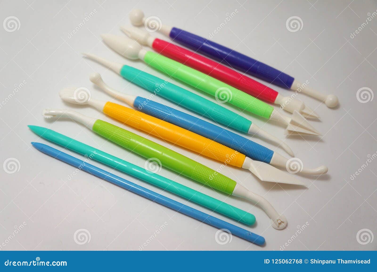 Fondant Decorating Instruments for Cake on White Background Stock Photo ...