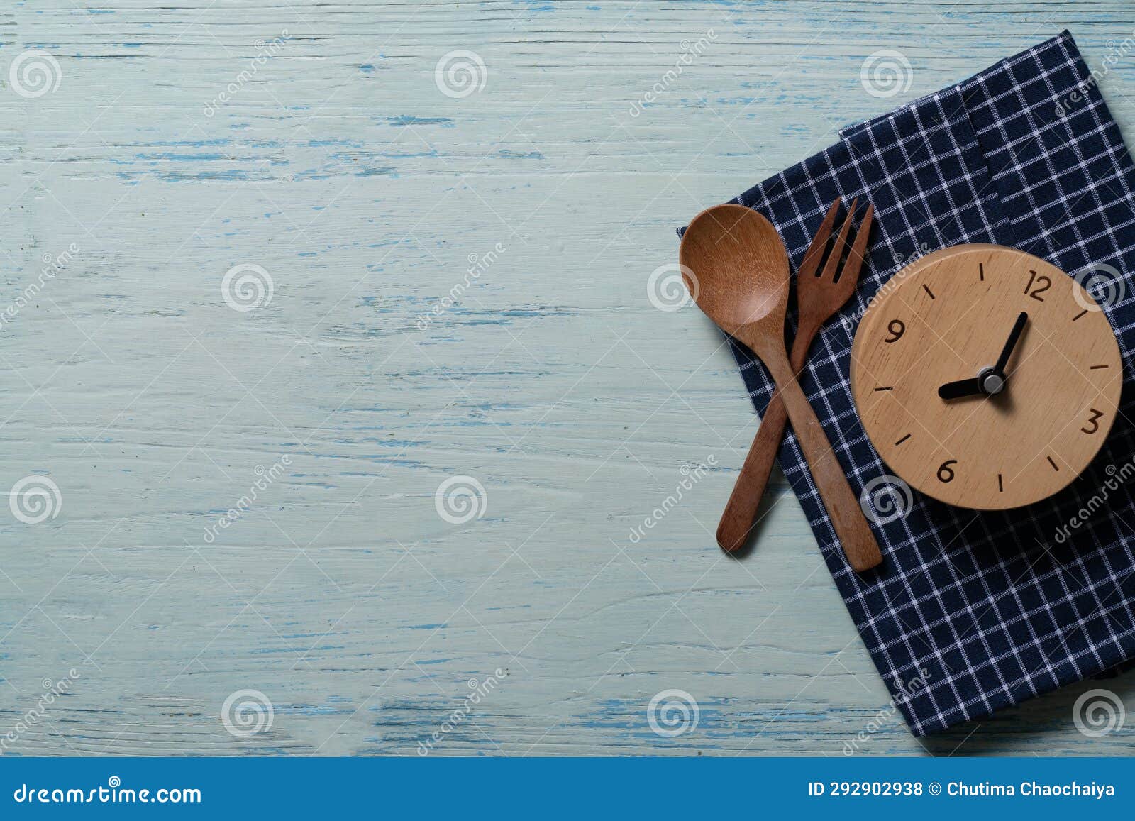 Food Clock Spoon and Fork, Healthy Food Breakfast Concept on the Blue ...