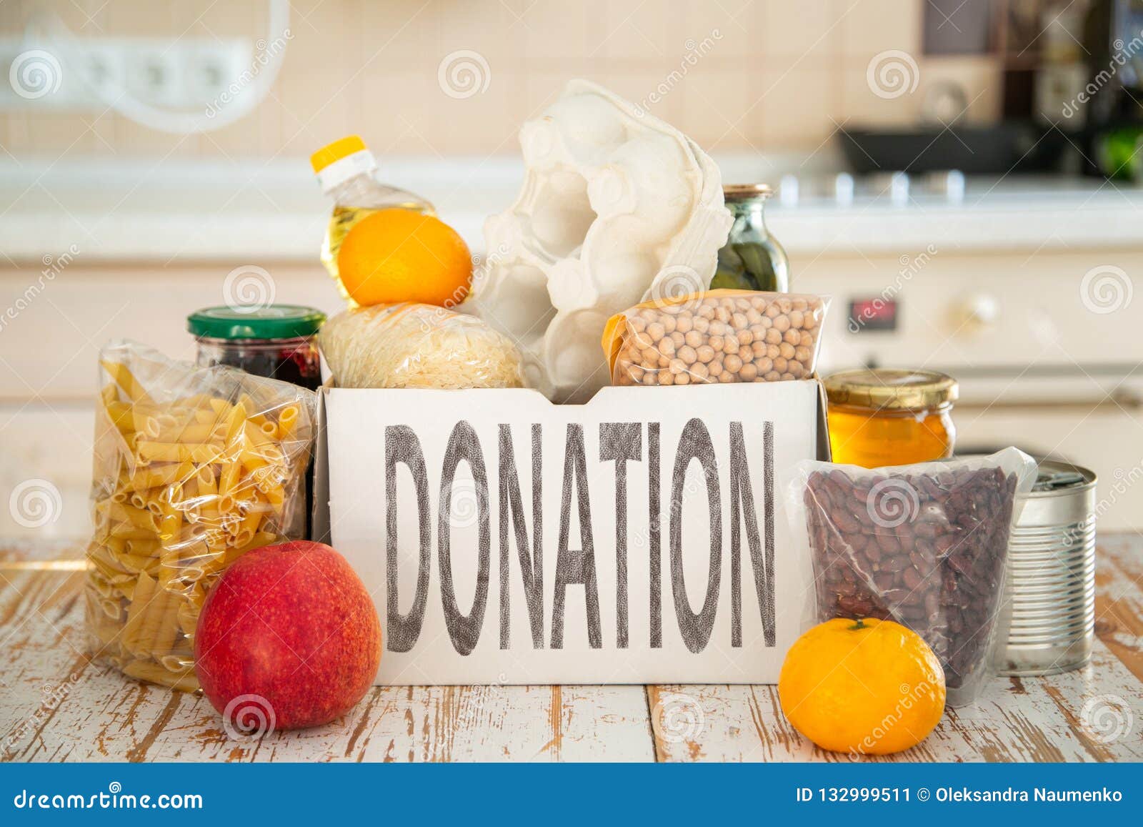 Food Donations in Box in Kitchen Background Stock Image - Image of ...