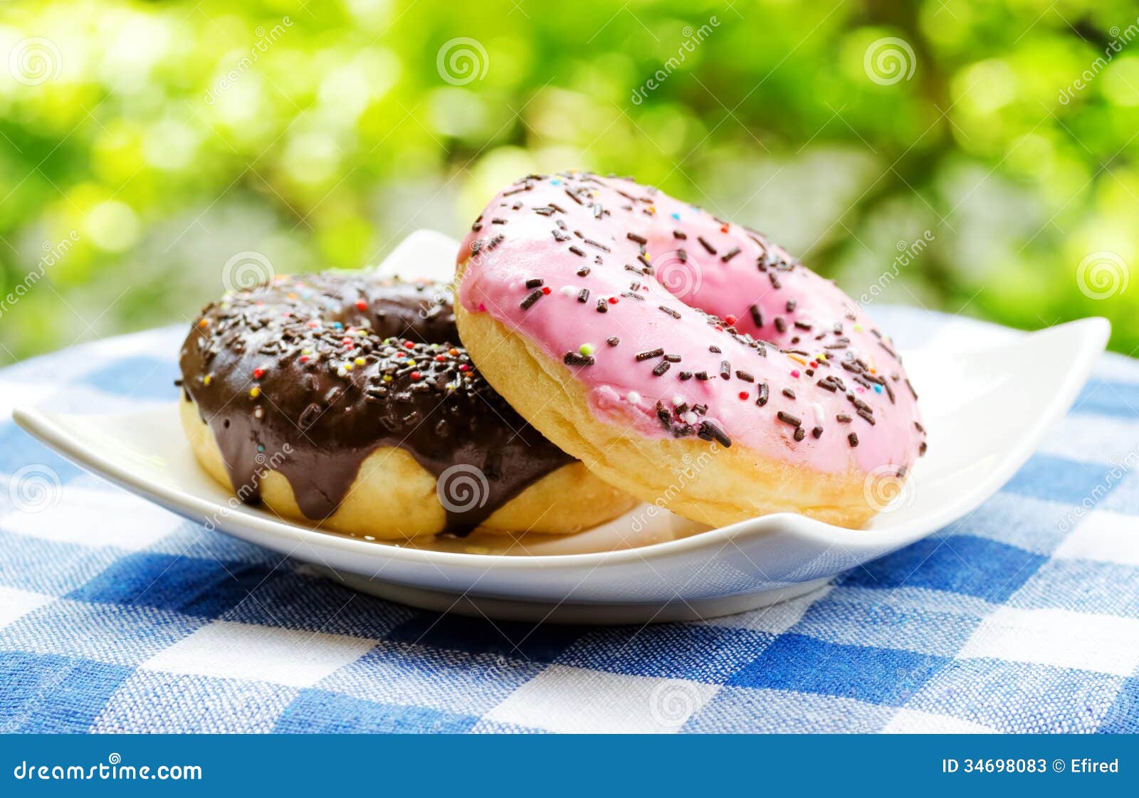 Fresh Donuts on Nature Background Stock Image - Image of icing, brunch ...