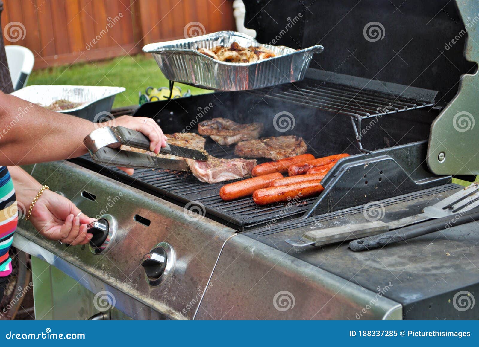Food on the Grill at a Backyard Cookout Stock Image - Image of grills ...