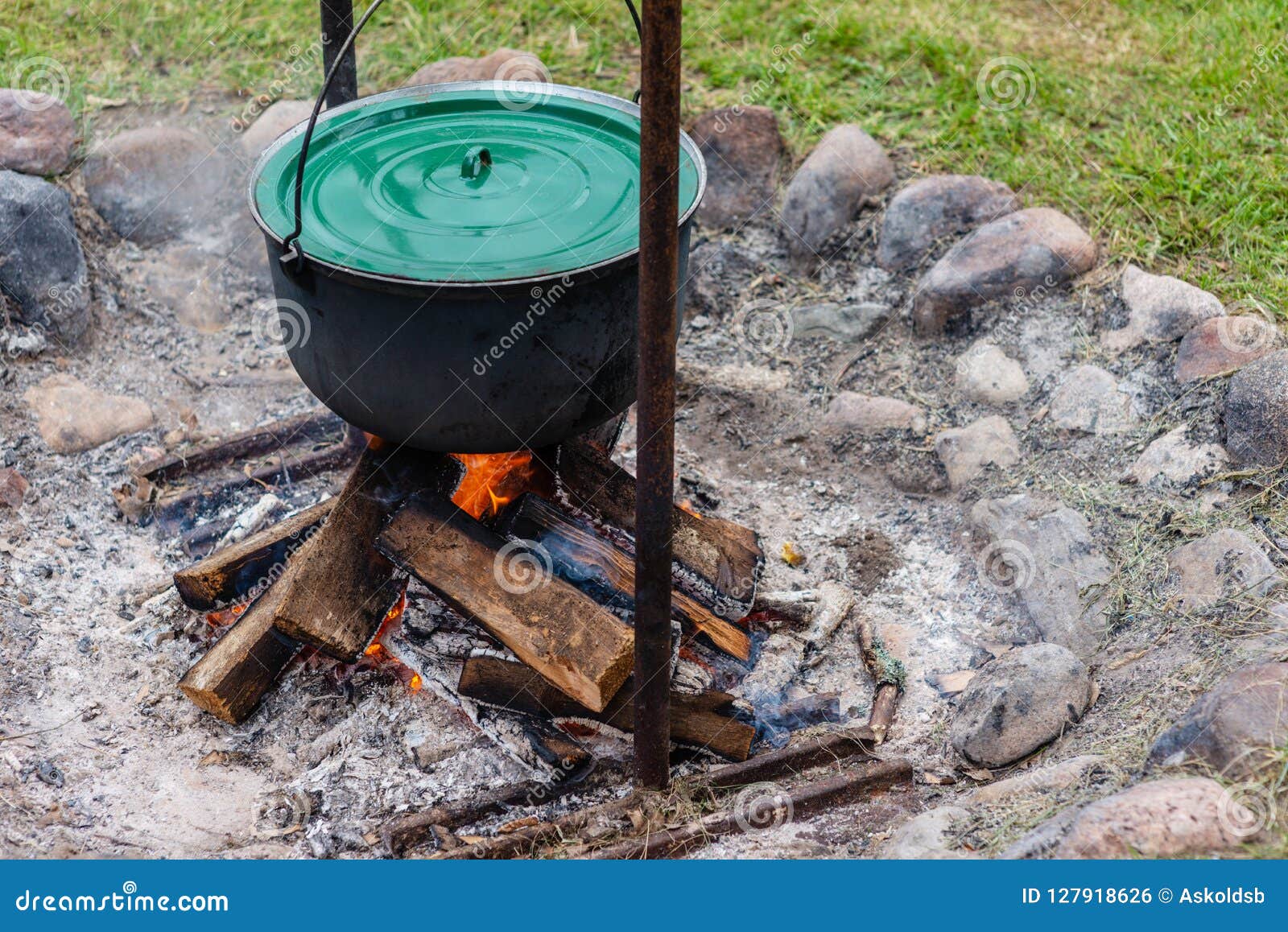 Food Pot Hangs Over Burning Fire. Stock Photo - Image of hangs ...
