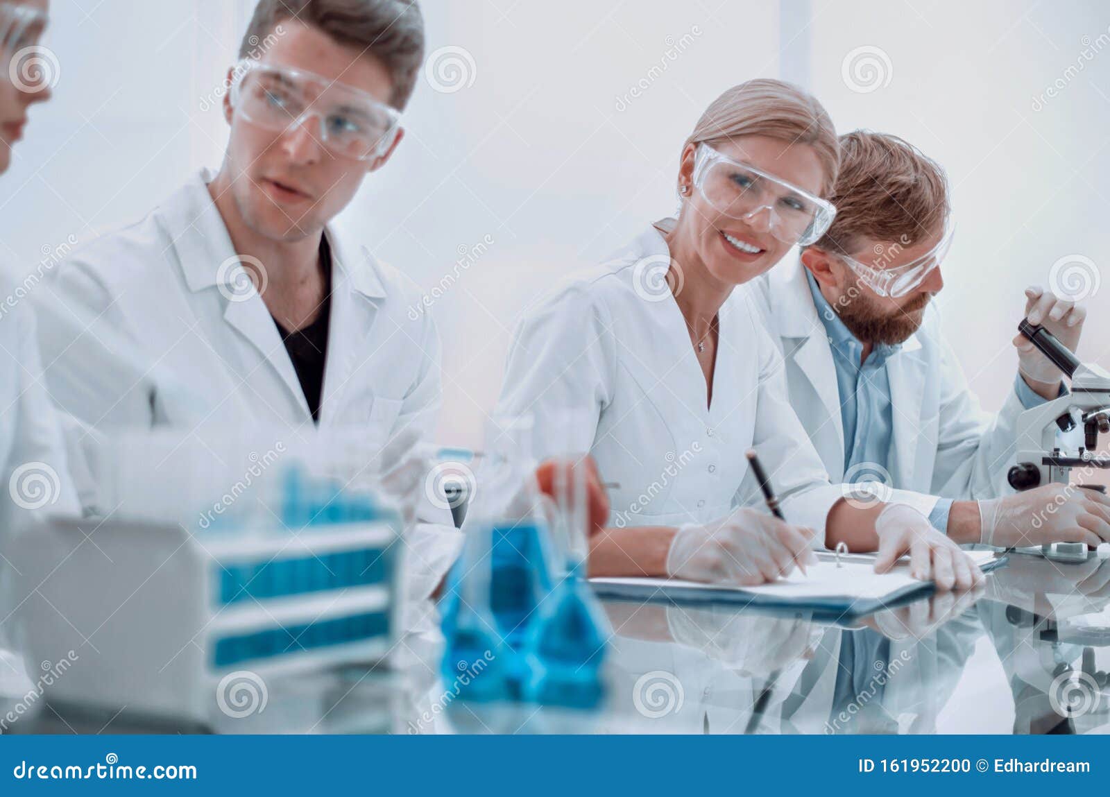Close Up. Group of Experts Checking the Quality of Fruit Stock Photo ...