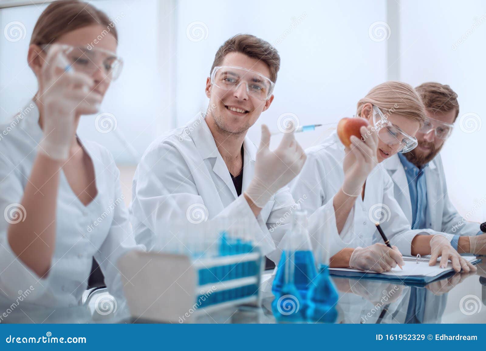 Close Up. Group of Experts Checking the Quality of Fruit Stock Image ...