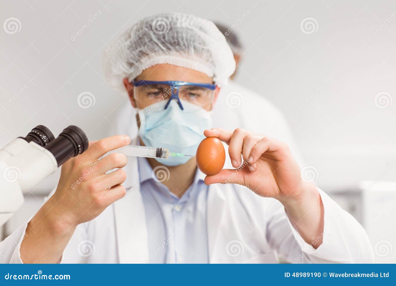 Food Scientist Injecting an Egg Stock Photo - Image of scientist ...