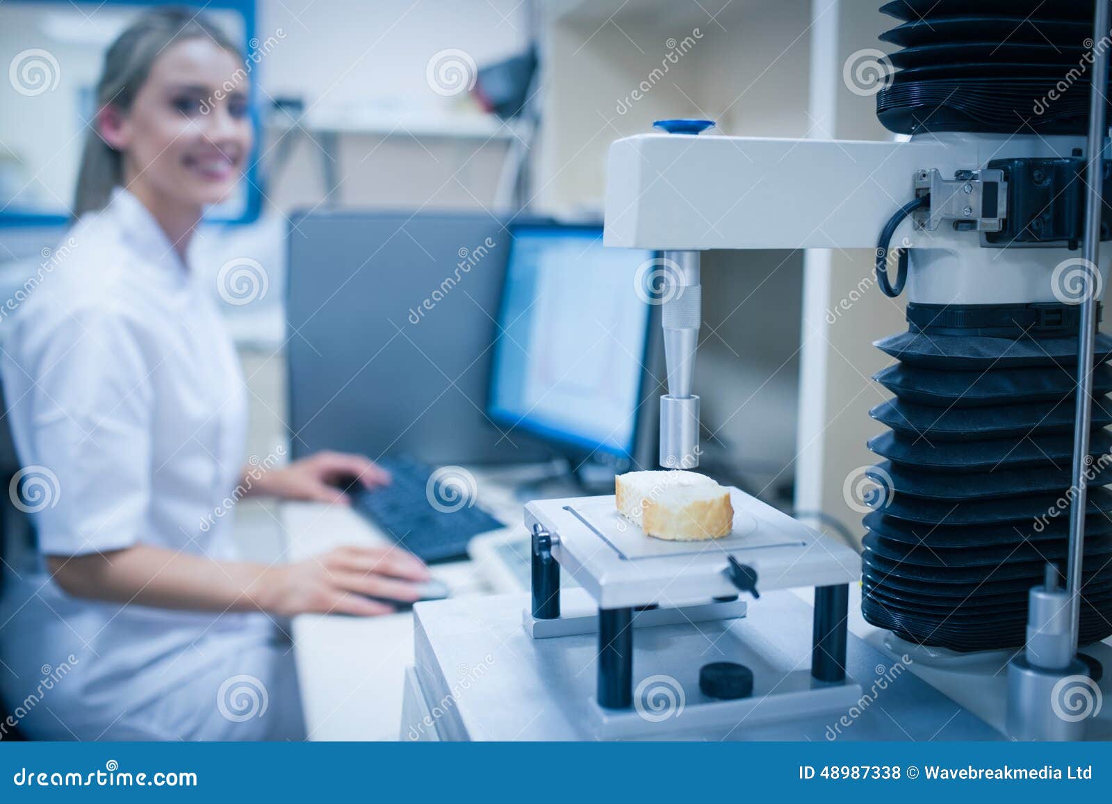 Food Scientist Using Technology To Analyse Bread Stock Photo - Image of ...