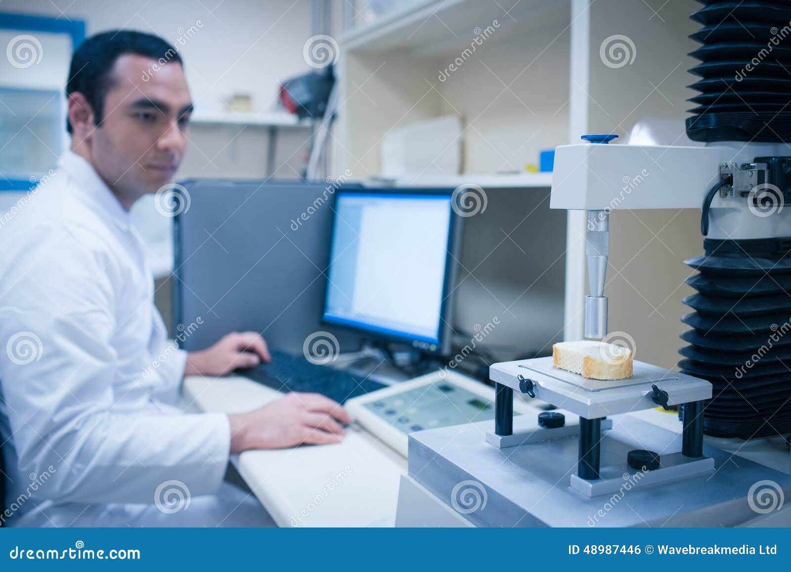 Food Scientist Using Technology To Analyse Bread Stock Photo - Image of ...