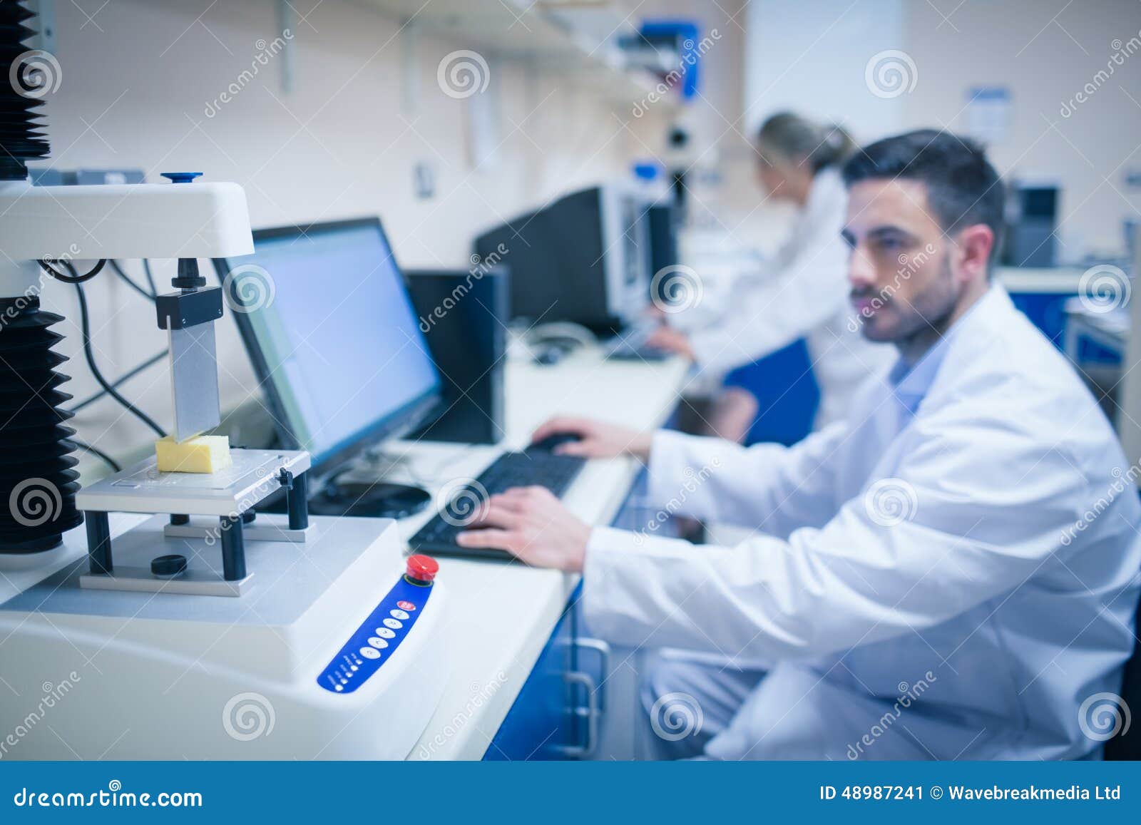 Food Scientist Using Technology To Analyse Cheese Stock Image - Image ...