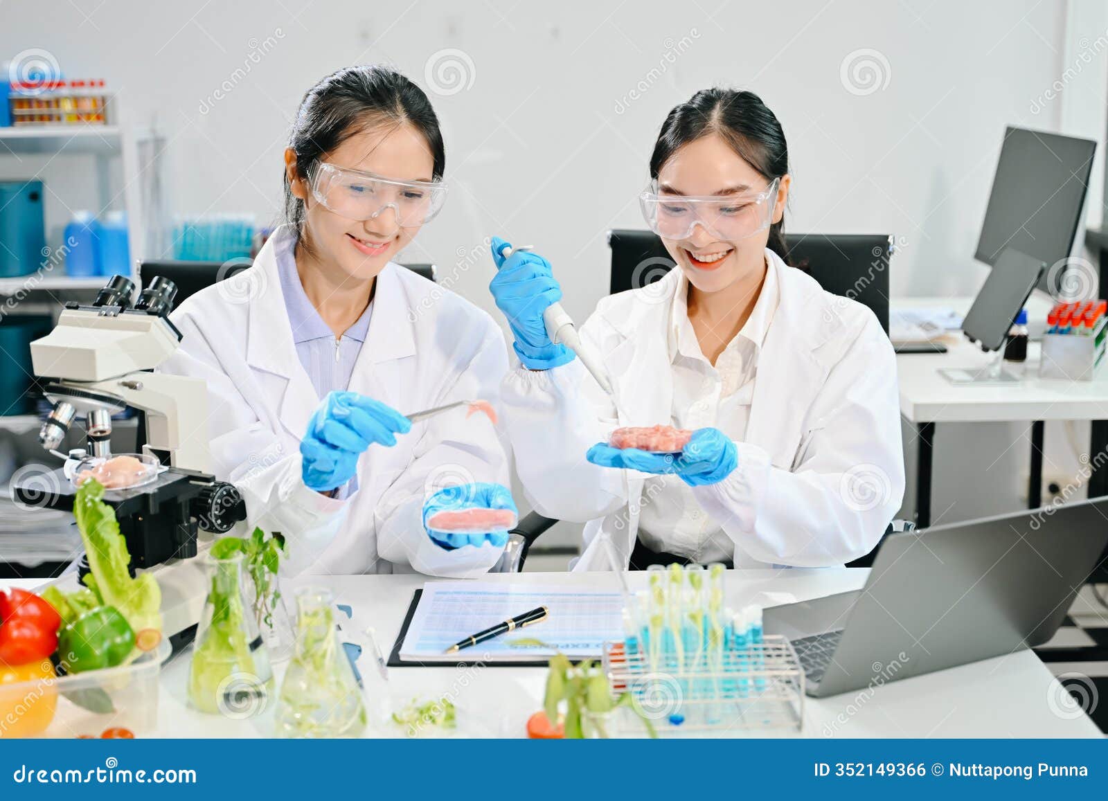 Food Scientists in Lab Coats, Testing Samples, and Analyzing Food ...