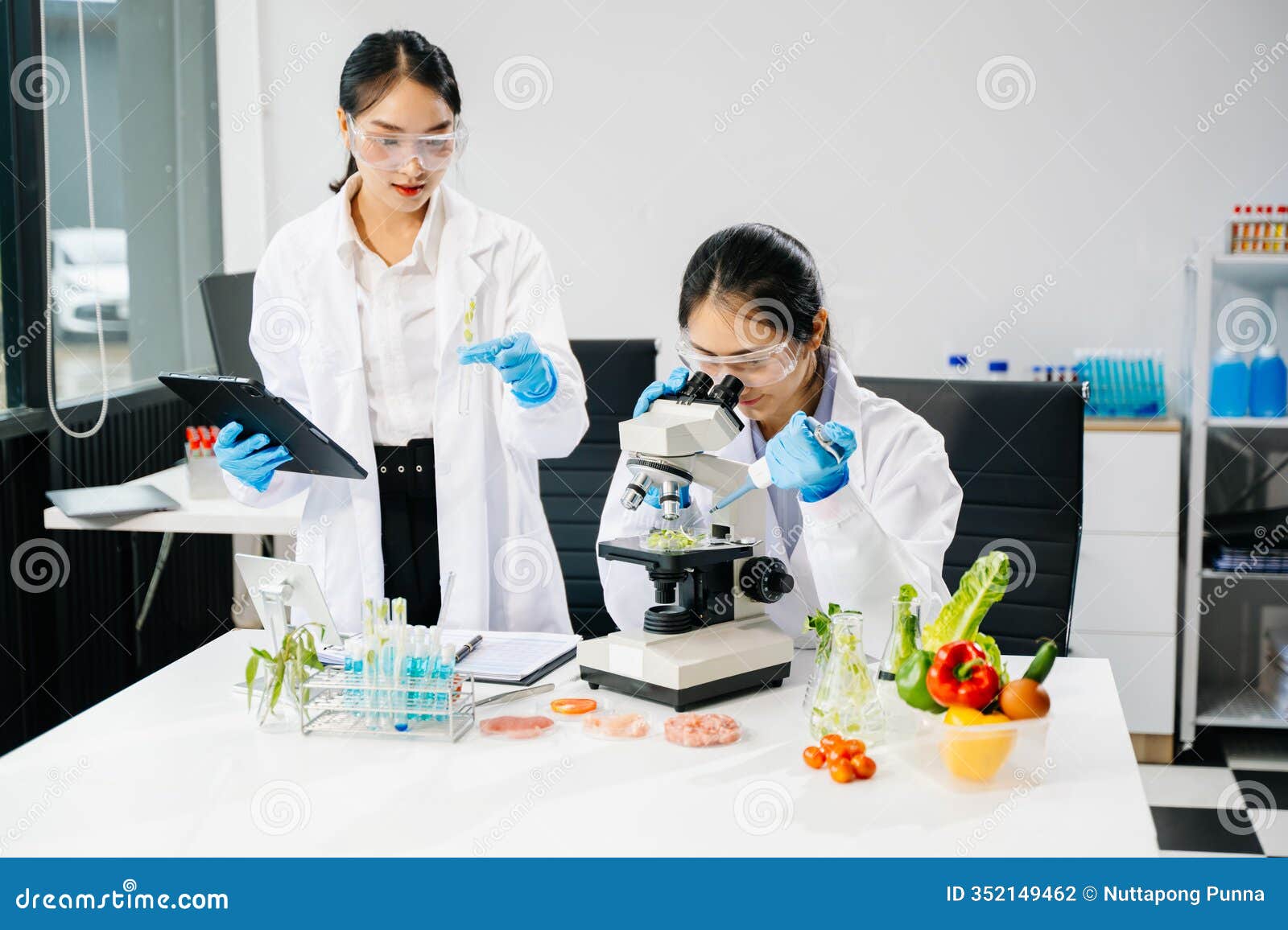 Food Scientists in Lab Coats, Testing Samples, and Analyzing Food ...