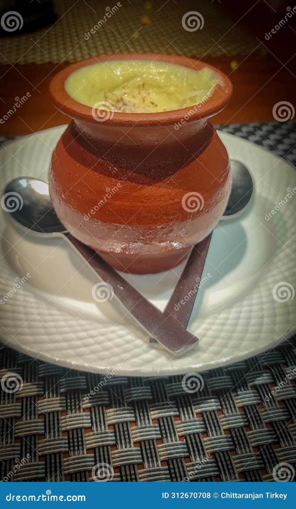 Food Served in an Earthen Pot on a Textured Stock Photo - Image of ...