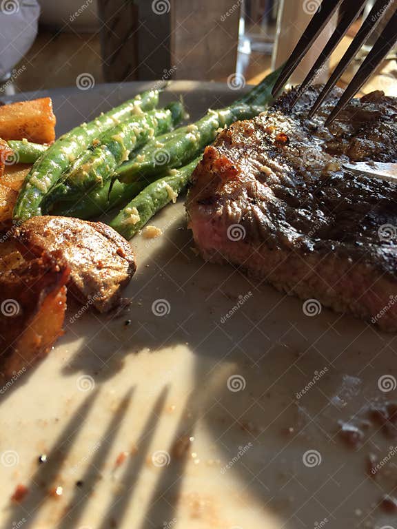 Steak stock image. Image of shadows, fork, stab, food - 105296403
