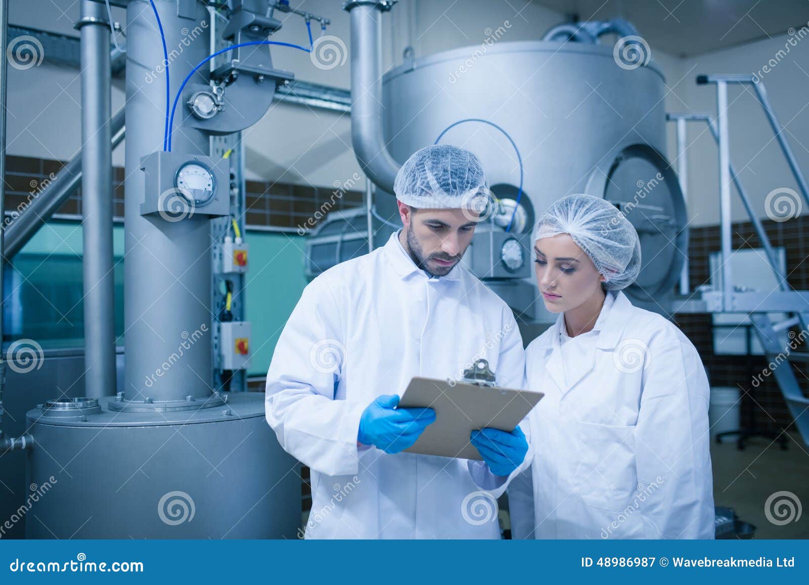 Food Technicians Working Together Stock Photo - Image: 48986987