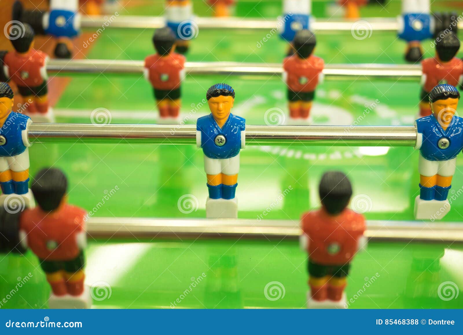 Foosball table soccer game stock photo. Image of grass - 85468388